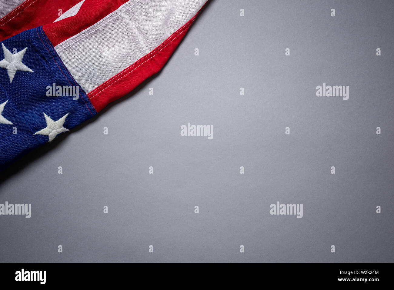 American flag on grey background with copy space Stock Photo - Alamy