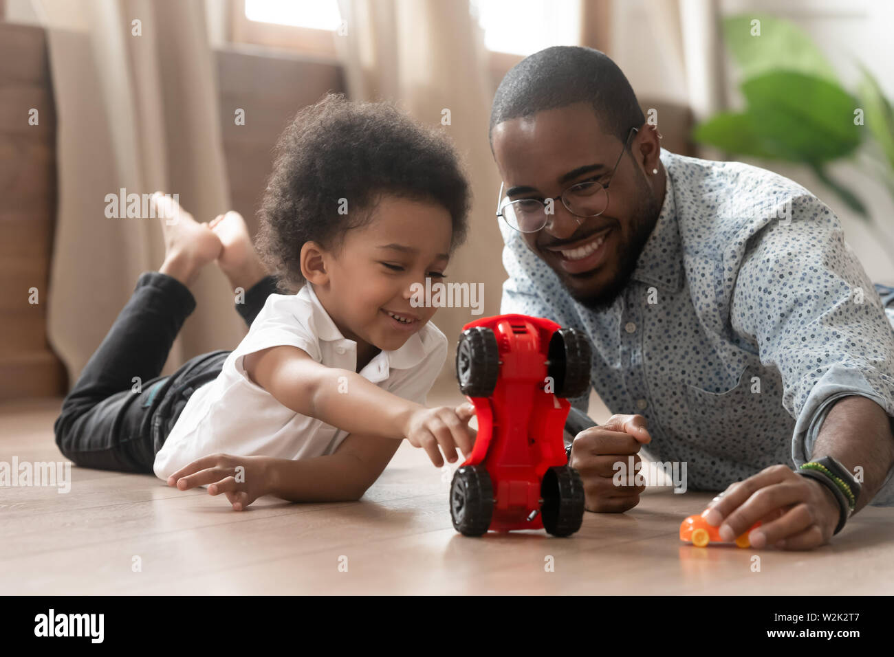 Baby Playing With Toy Car