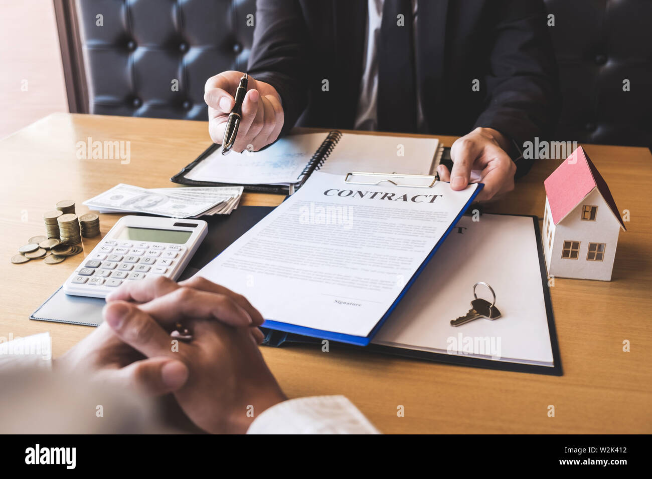 Client signing mortgage loan agreement hi-res stock photography and ...