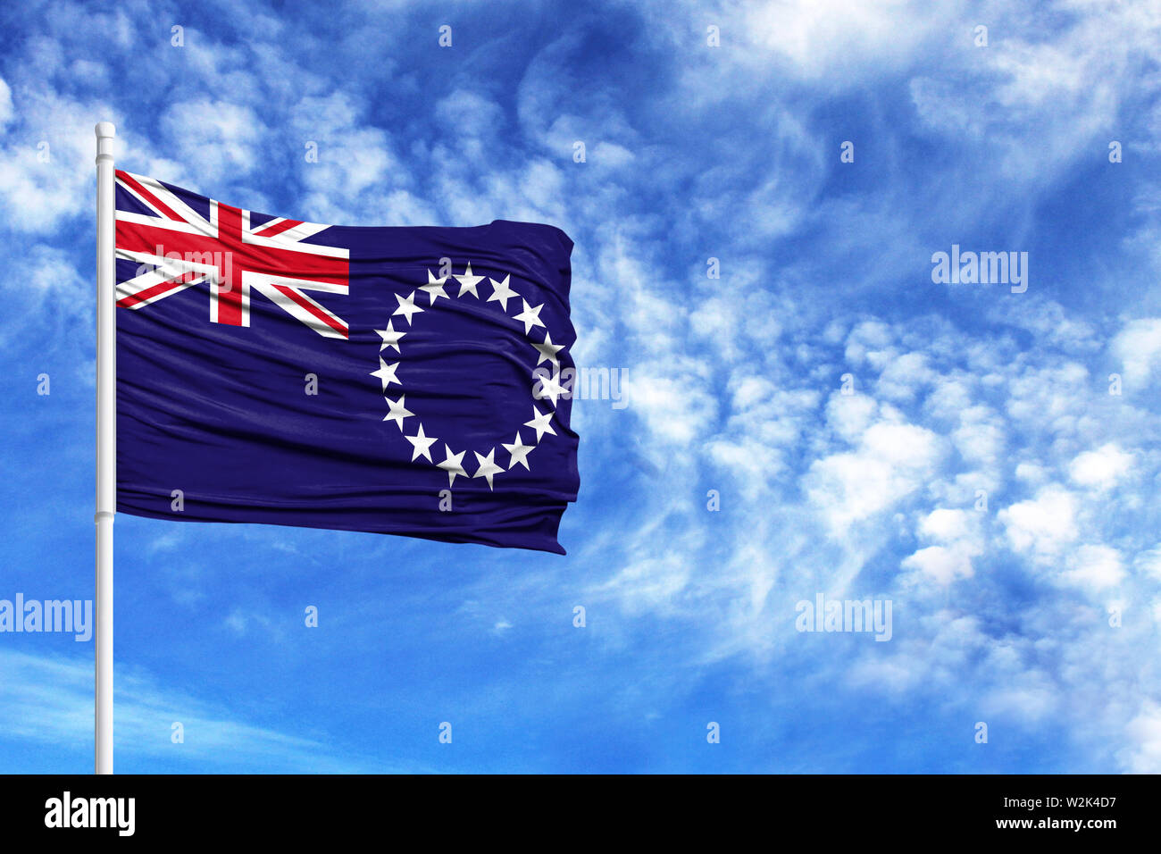 National flag of Cook Islands on a flagpole in front of blue sky Stock ...