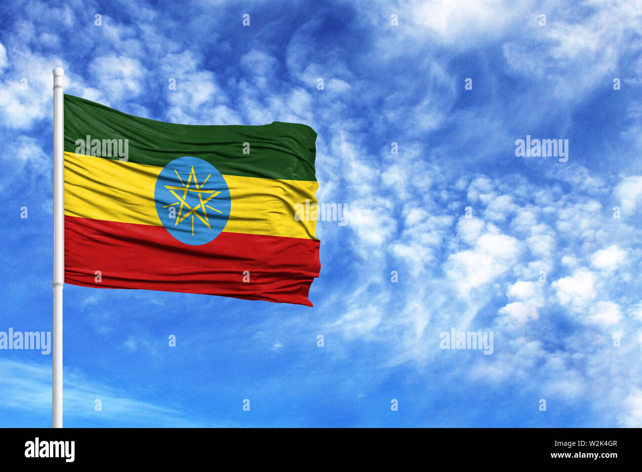 Ethiopia flag on flag pole hi-res stock photography and images - Alamy