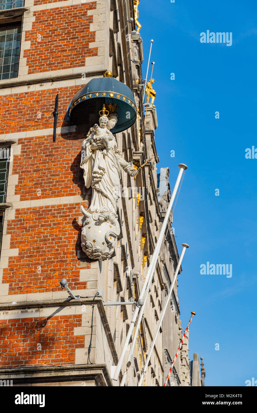 Statue of Madonna Virgin Mary with child on corner house in Grand ...