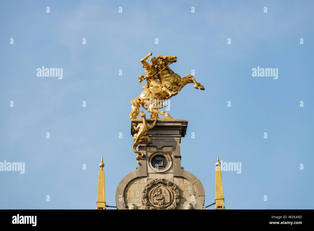 Gilded statue on top of Guildhouses view from Grand Market Square in ...