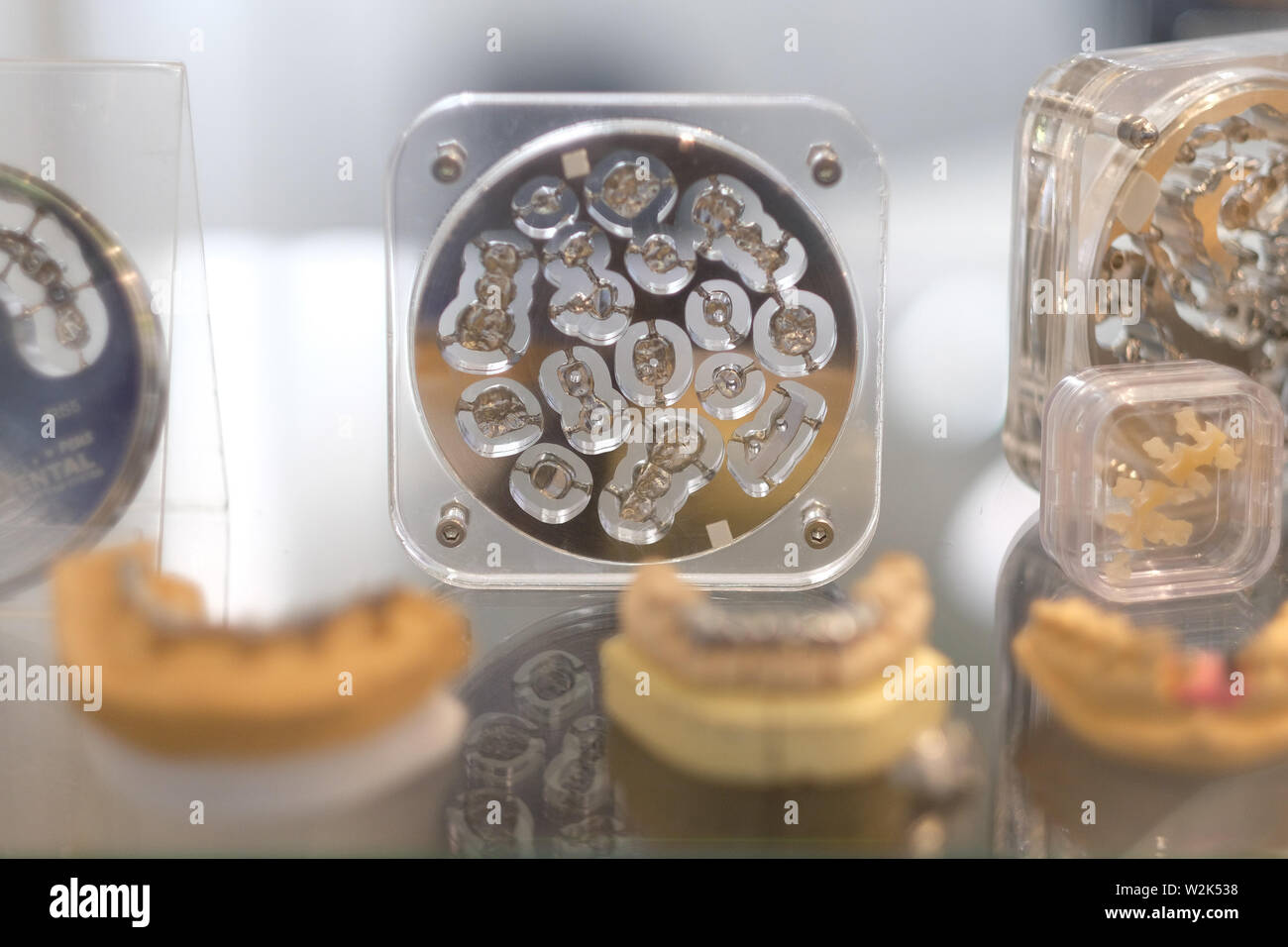 Samples of tooth crowns for prosthetics at the dental exhibition Stock ...