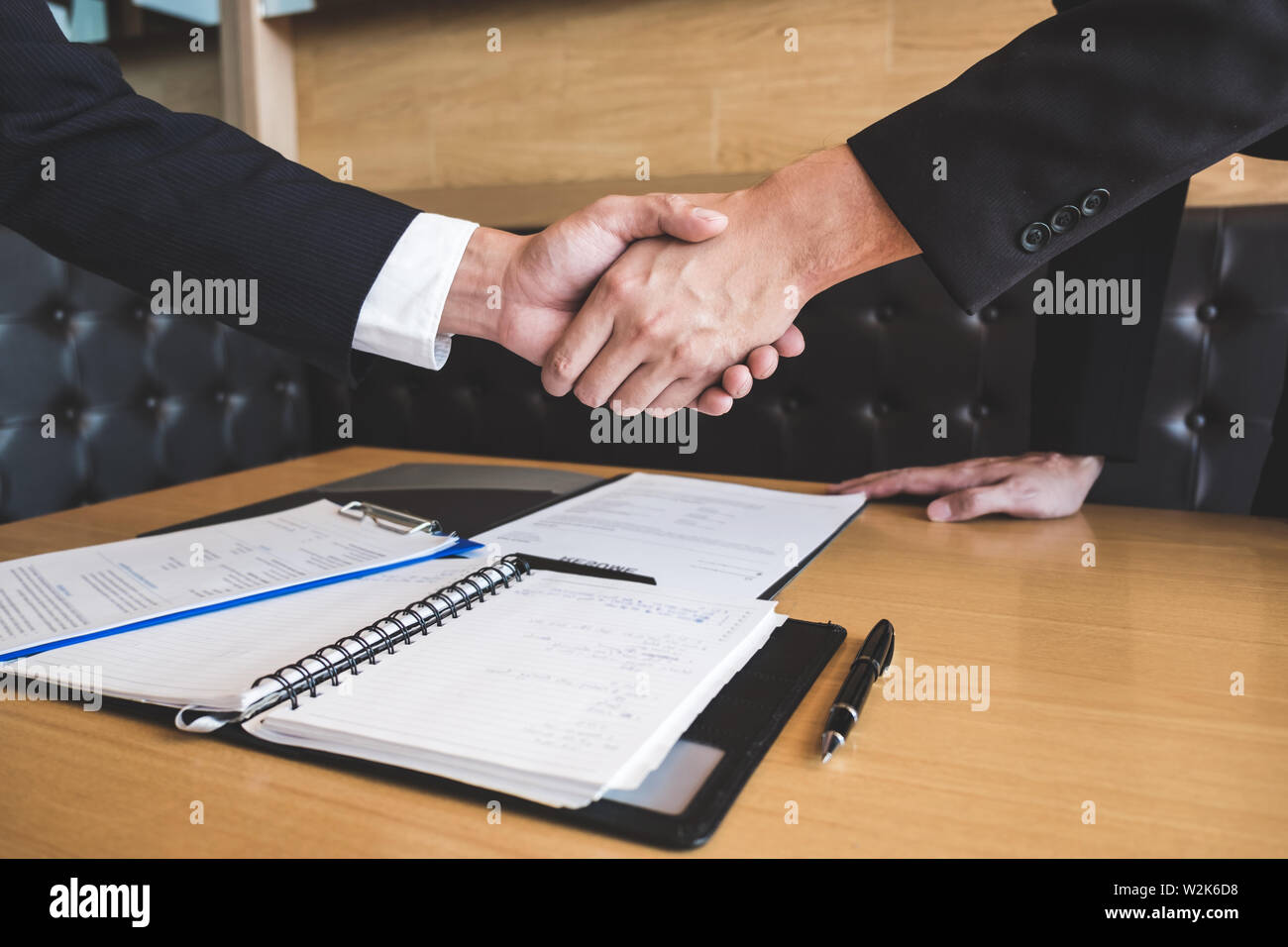 Interviewer handshaking the applicant hi-res stock photography and ...