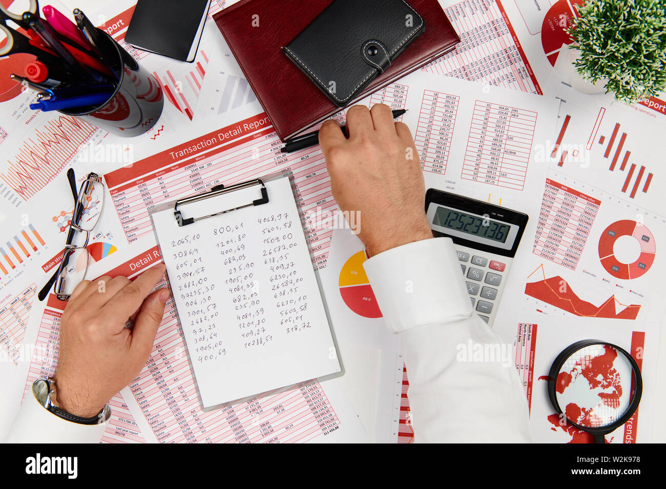 Business reports, data tables and charts - directly above view of ...