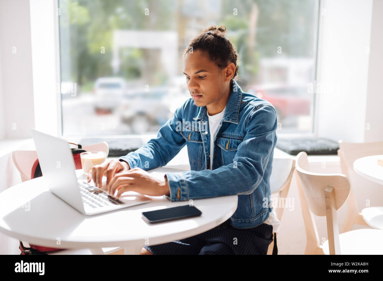 Thoughtful man typing message on hi-res stock photography and images ...