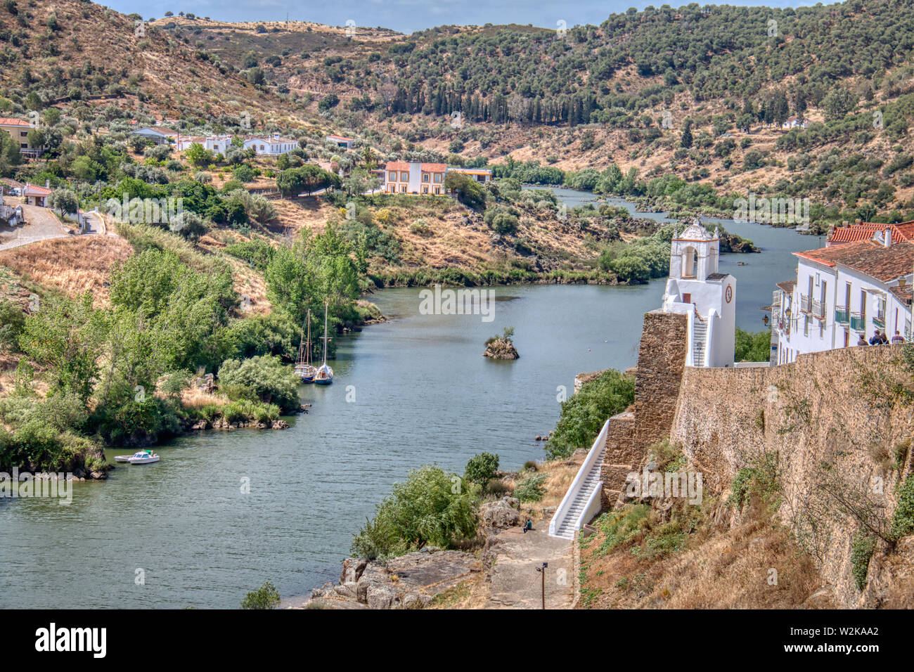 The Guadiana River as it passes through Mertola, Portugal Stock Photo ...