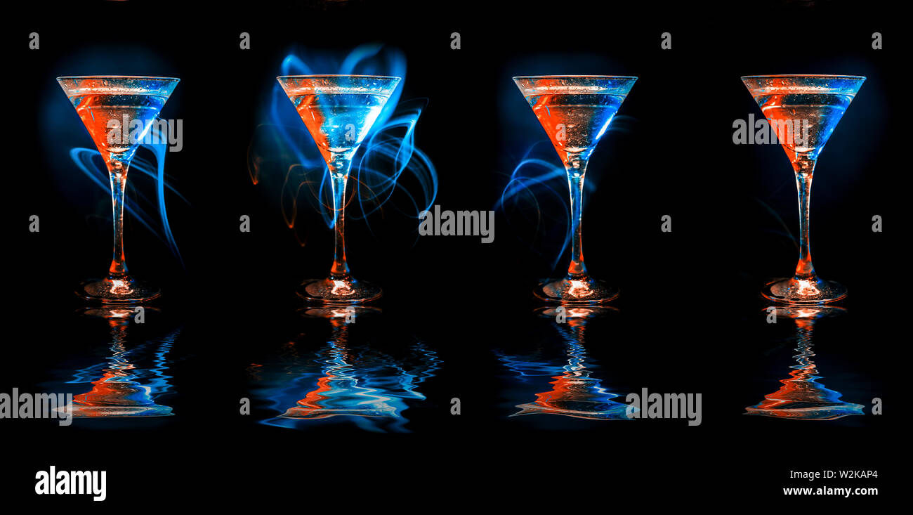 Colorful Bright fresh modern cocktails in glasses on black background ...