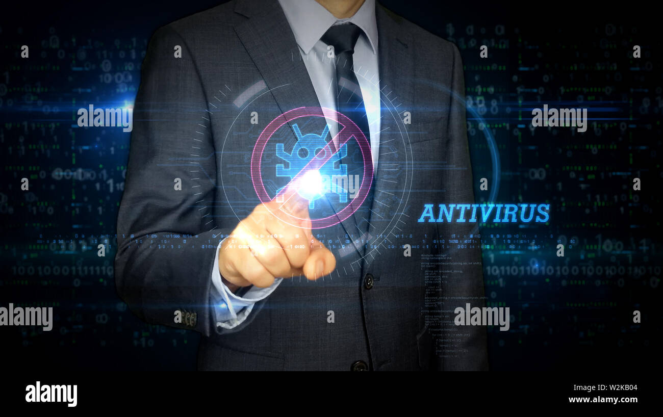 A businessman in suit touch the screen with antivirus symbol hologram ...