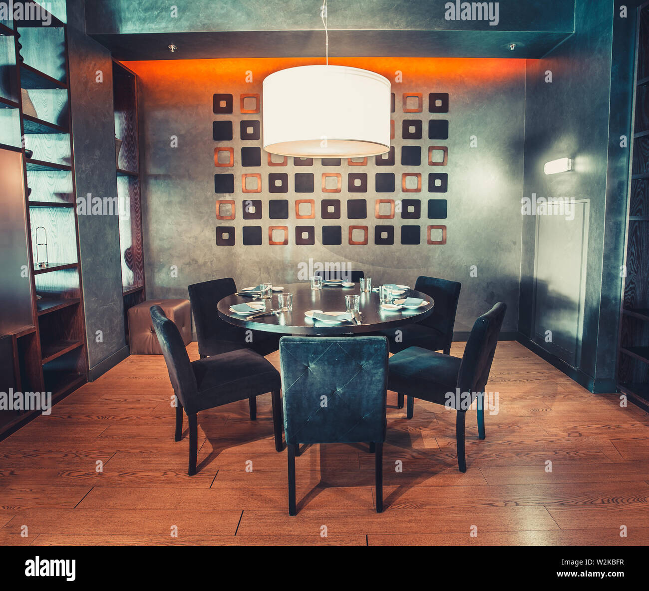 Interior of modern restaurant with table, chairs and tableware Stock ...