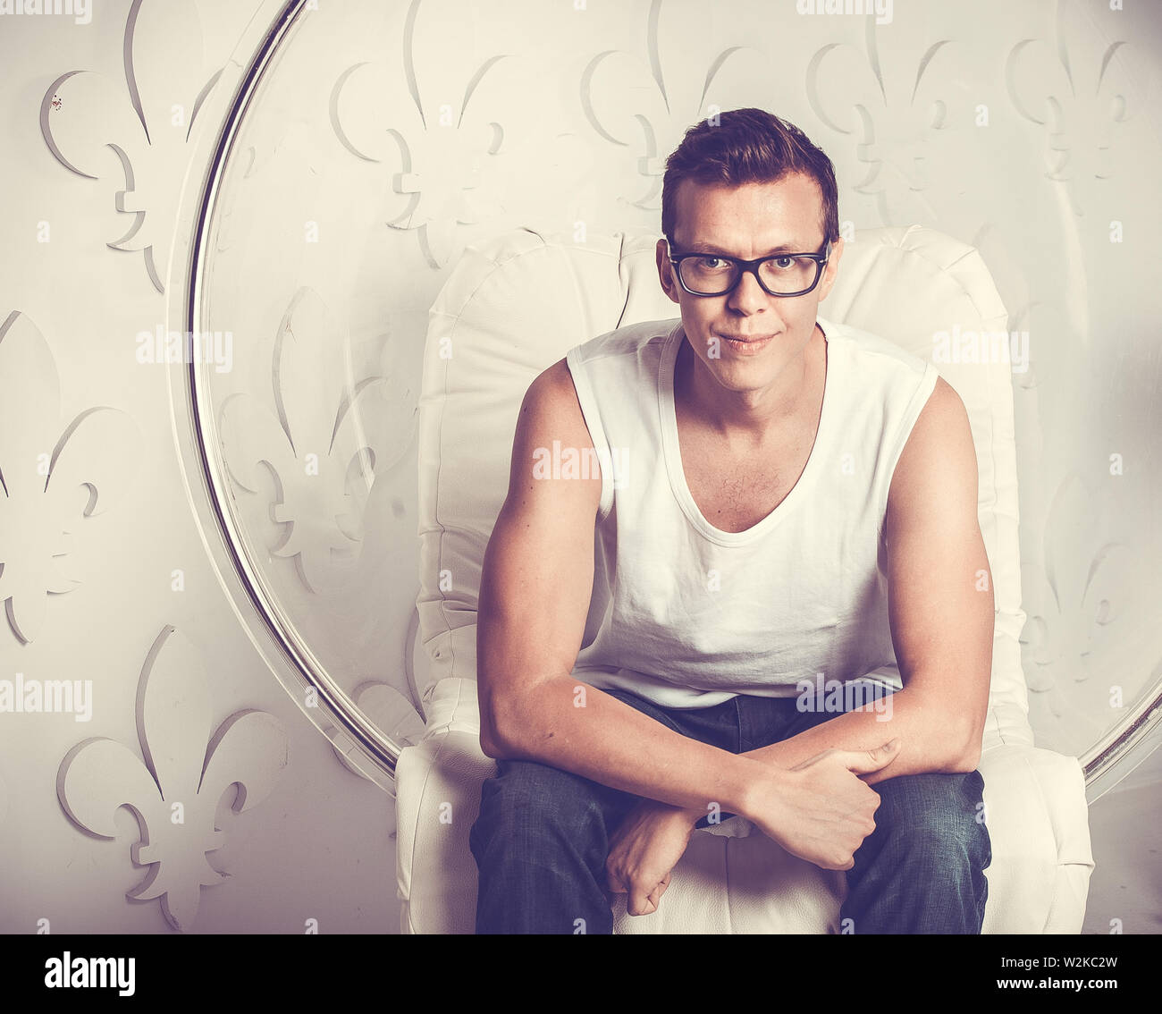 Male model sitting chair hi-res stock photography and images - Alamy