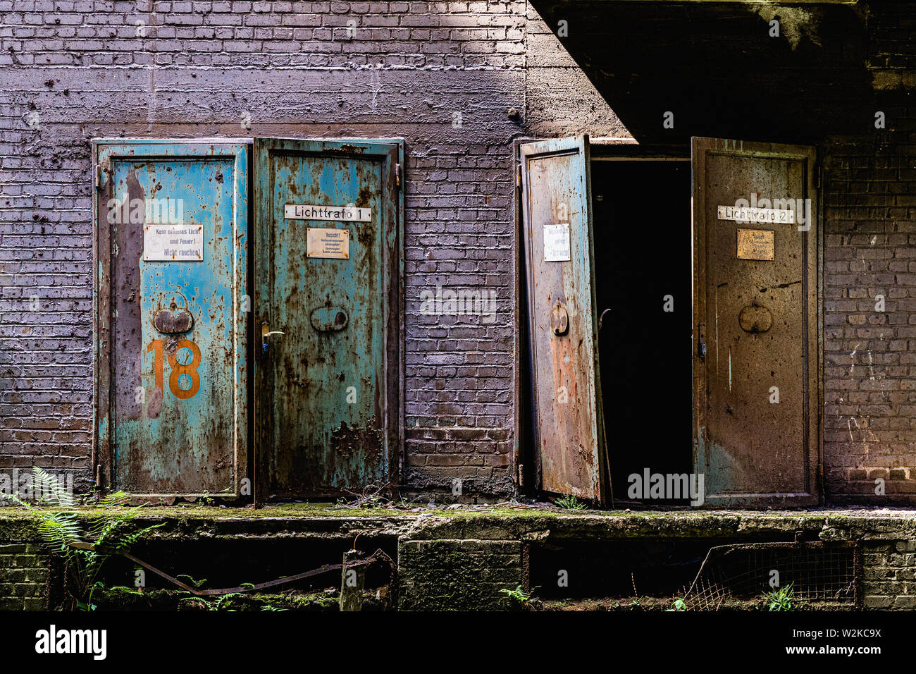 Old steel doors at a steel work site Stock Photo - Alamy