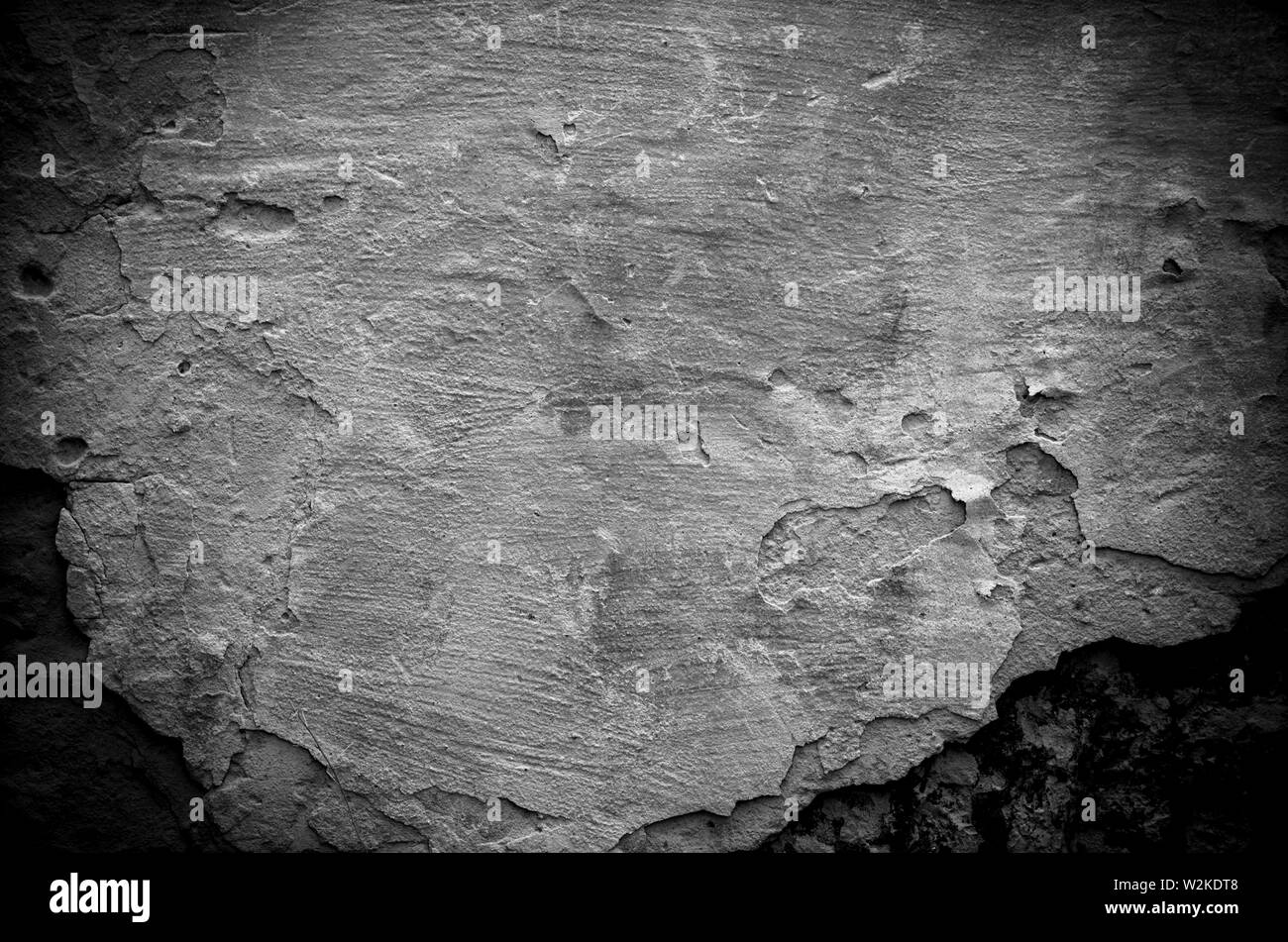 old cracked stone wall background Stock Photo - Alamy