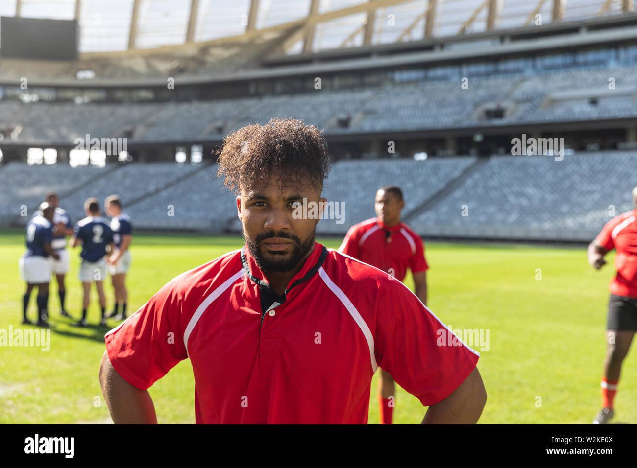 Male rugby player standing in stadium Stock Photo - Alamy