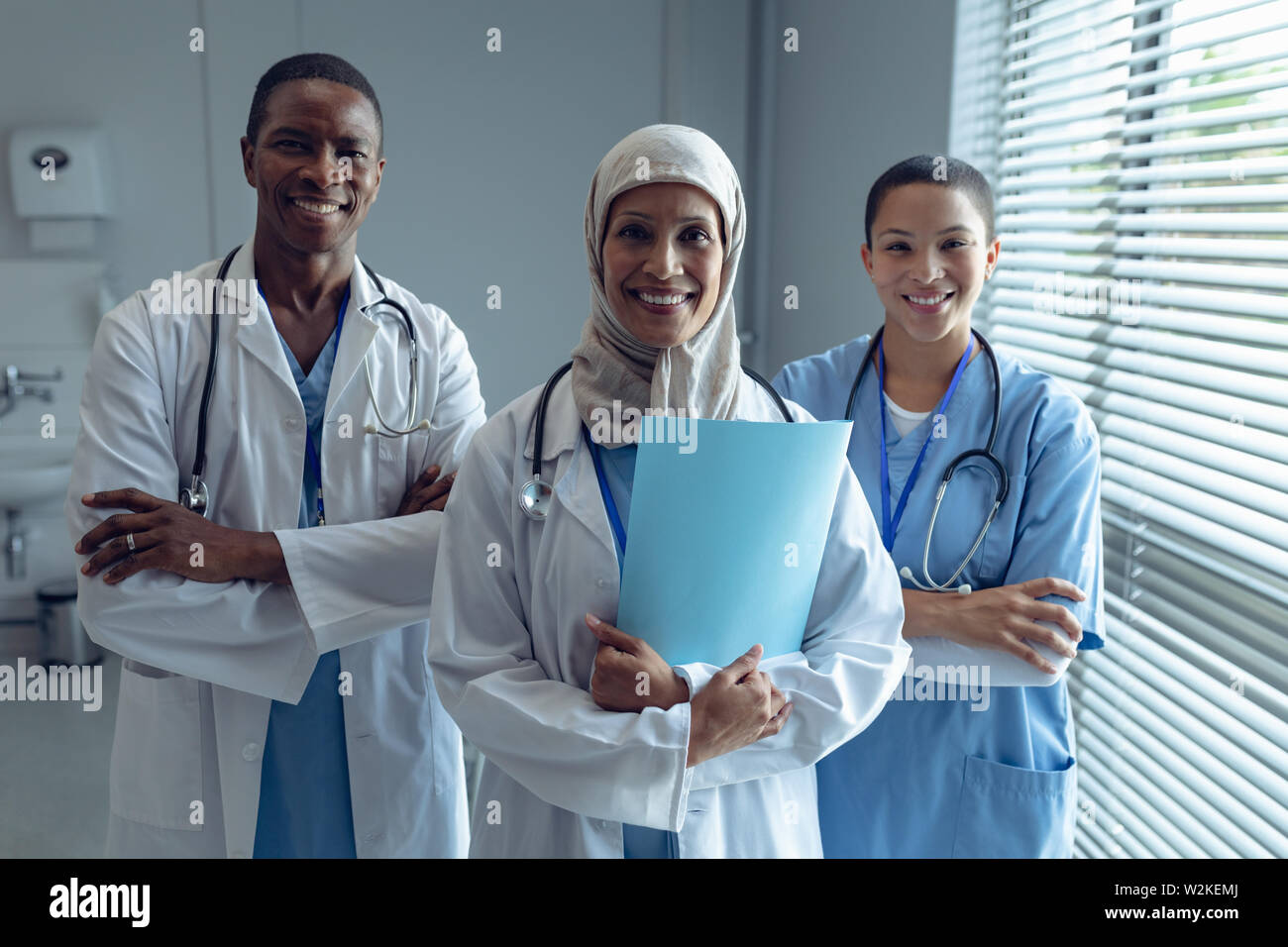 Medical teams standing together in hospital Stock Photo - Alamy