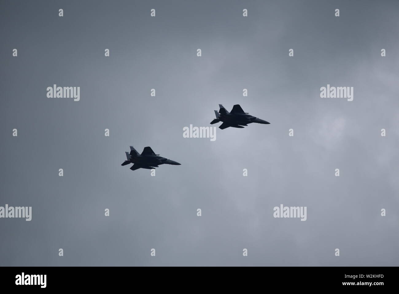f 15 eagle jet fighter USAF flying past against a cloudy sky Stock ...