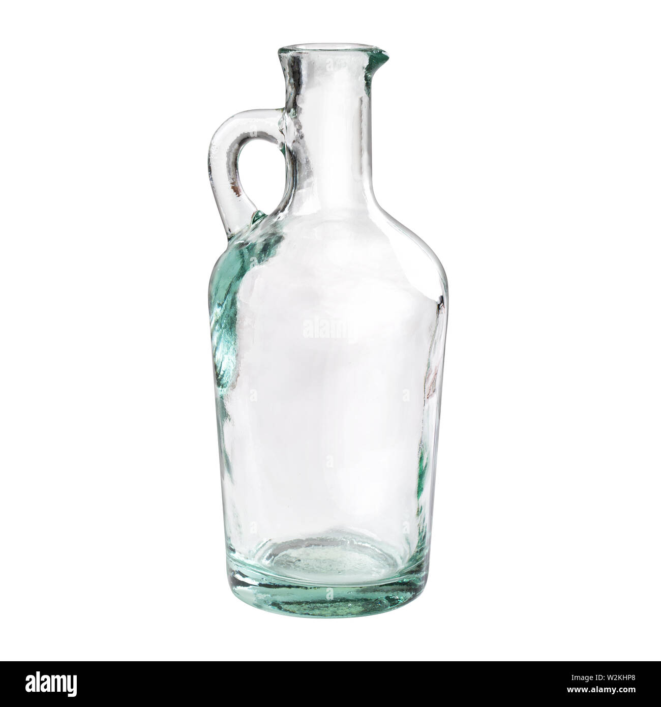 Antique glass jar for olive oil isolated on white background, front ...