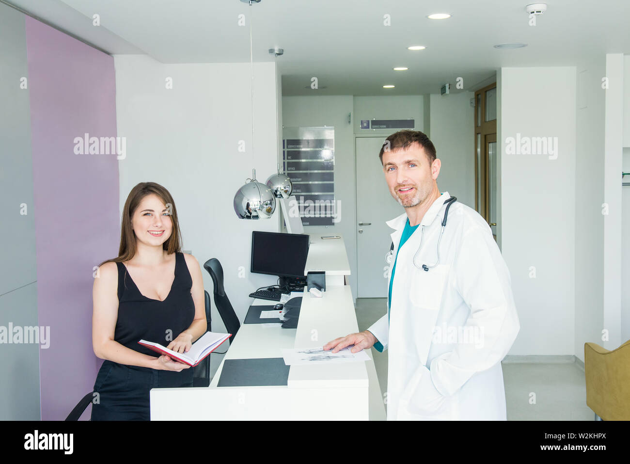 Administrative assistant desk administration hi-res stock photography ...