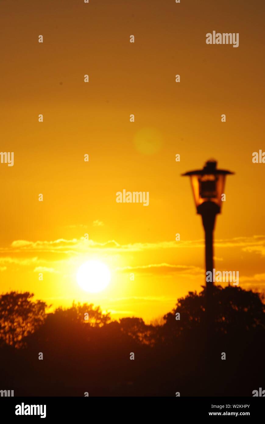 Orange yellow sunset glow hi-res stock photography and images - Alamy