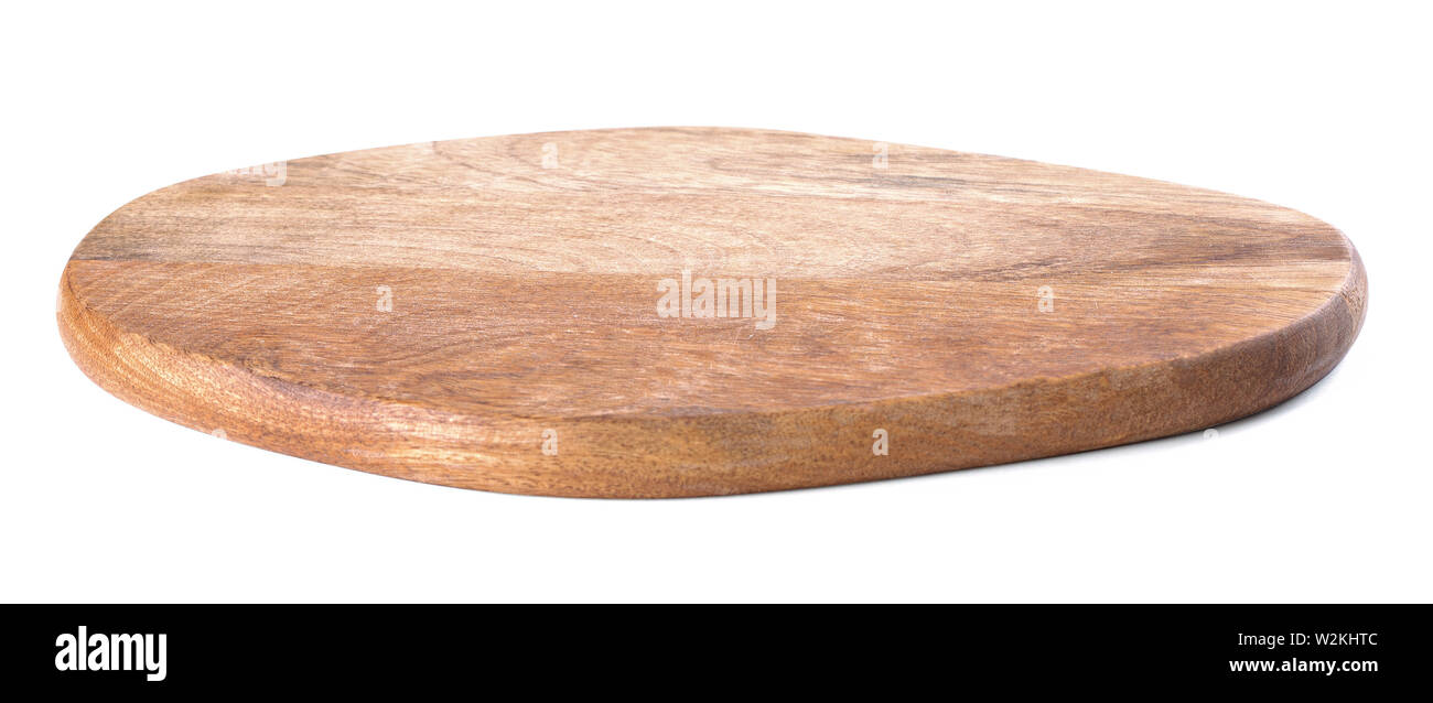 Wooden oval kitchen board for cutting products isolated on white ...