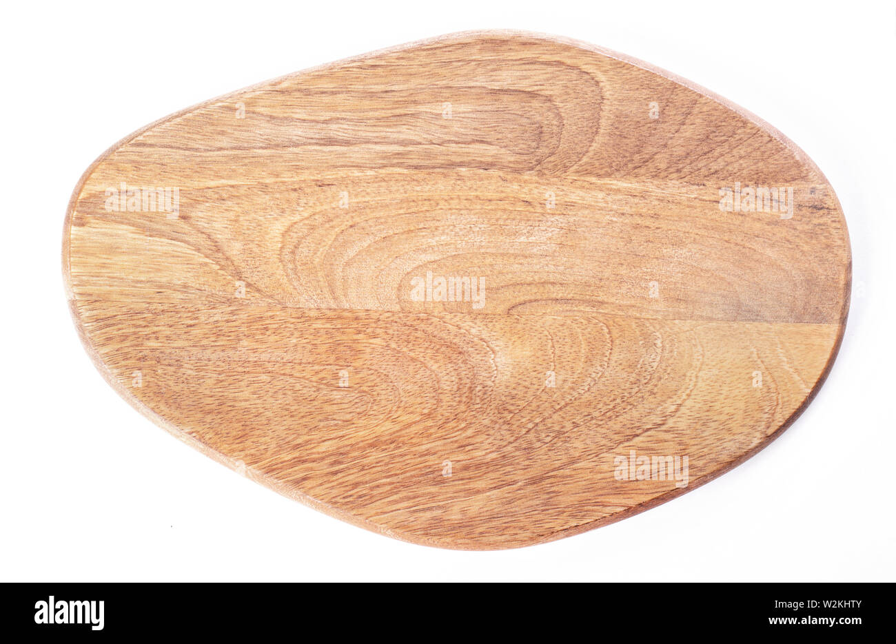Wooden oval kitchen board for cutting products isolated on white ...
