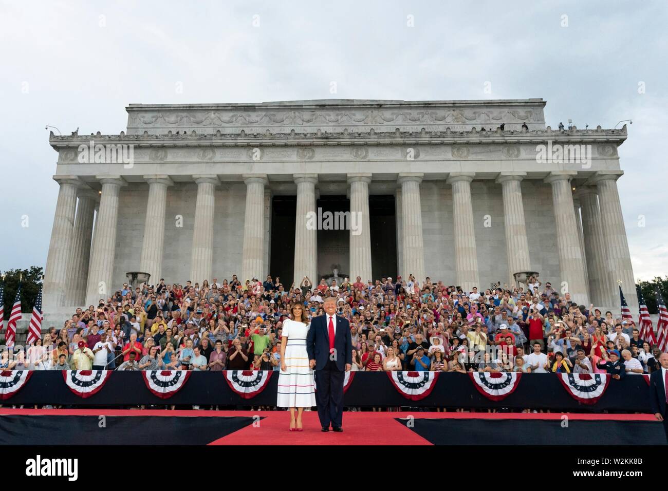 U.S President Donald Trump joined by First Lady Melania Trump stand in ...