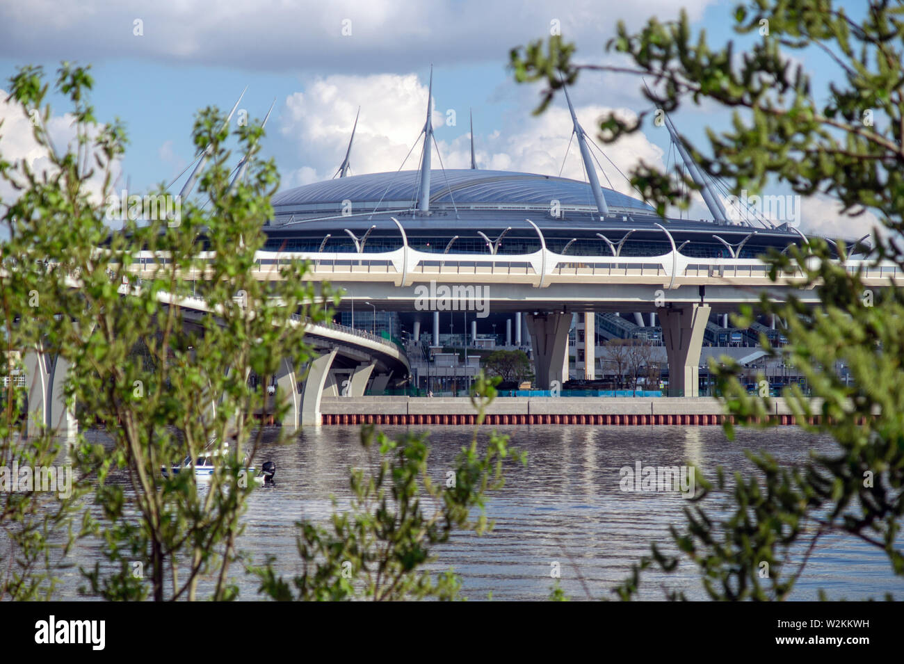 football stadium on the background of green trees and a river Stock ...