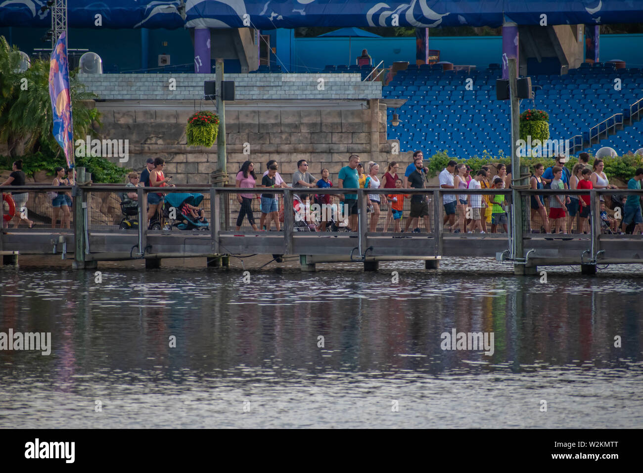 Orlando, Florida. June 23 2019. People walking on bridge over Seven ...