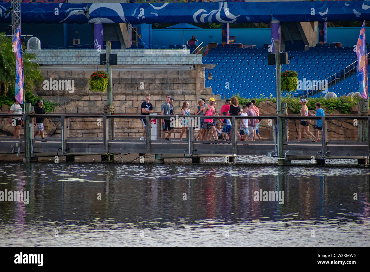 Orlando, Florida. June 23 2019. People walking on bridge over Seven ...