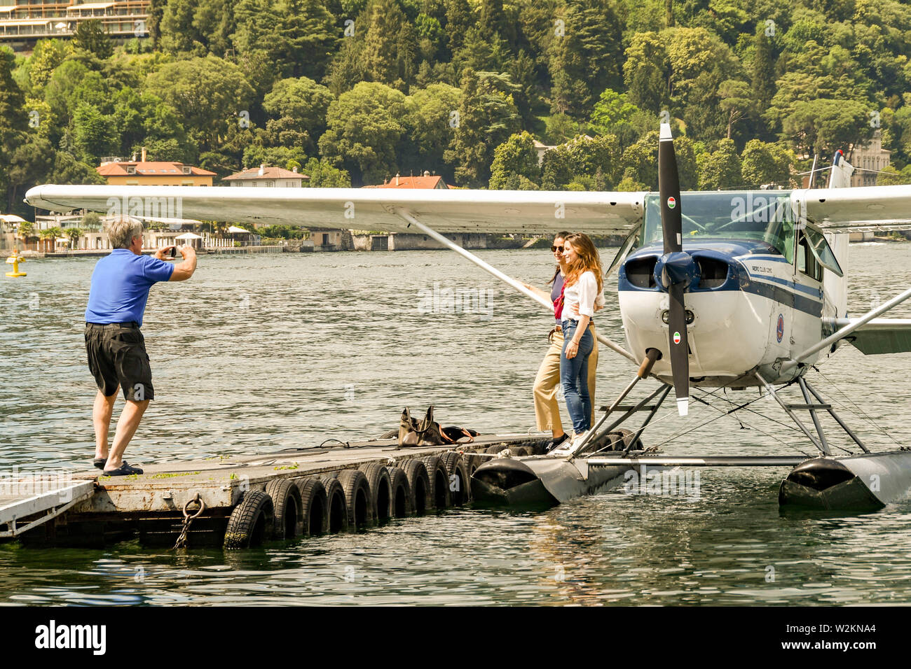 COMO, LAKE COMO, ITALY - JUNE 2019: Two people having their picture ...