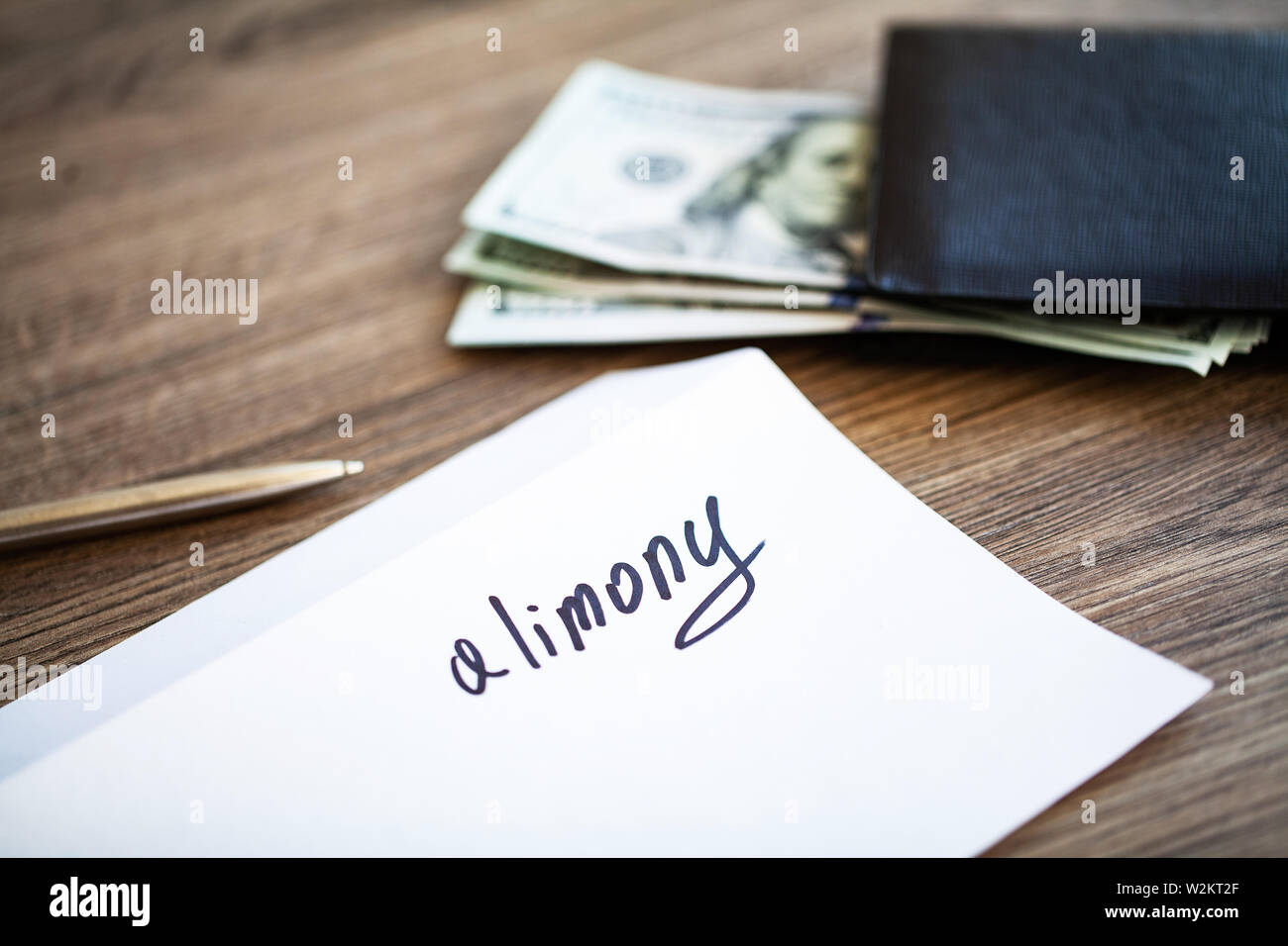 Payments alimony. White envelope with sign alimony and money Stock ...