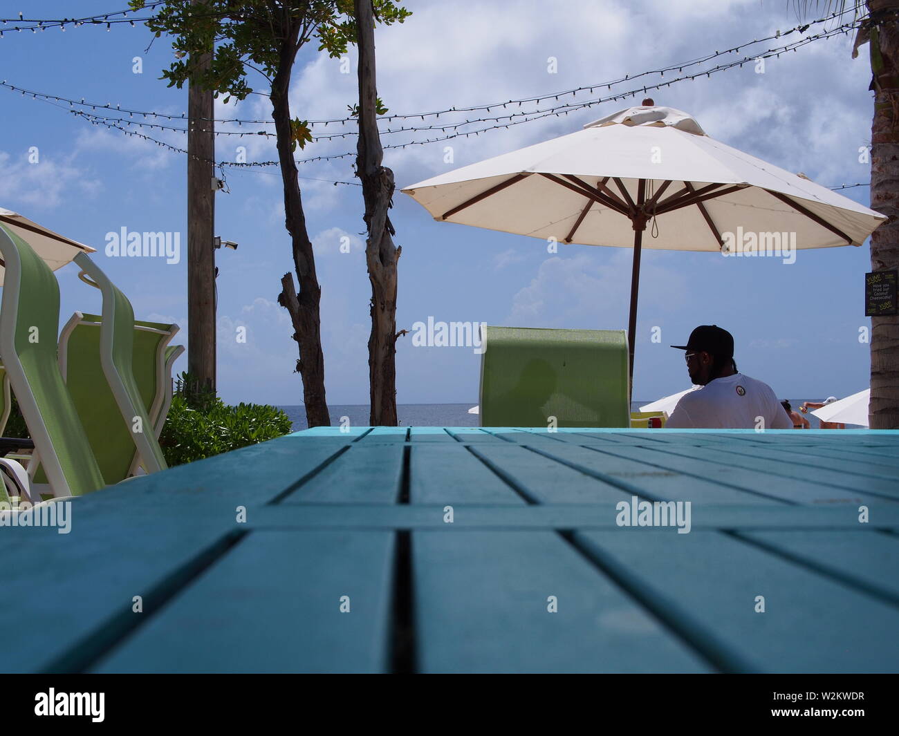 Turquoise picnic table at Blanchards Beach Shack, Meads Bay, Anguilla ...