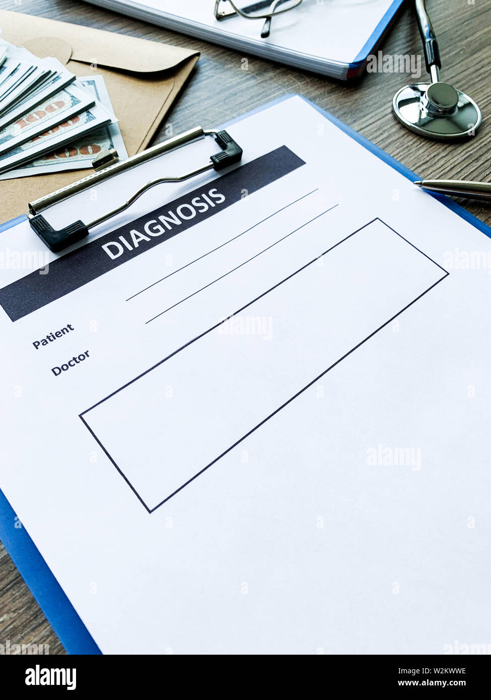 Diagnosis form with the patient's data on the doctors desk Stock Photo ...