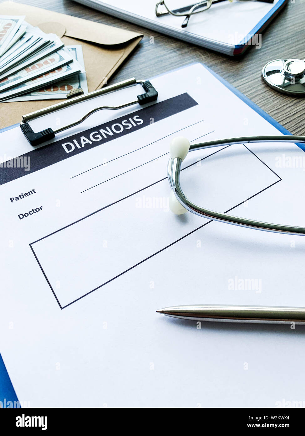 Diagnosis form with the patient's data on the doctors desk Stock Photo ...