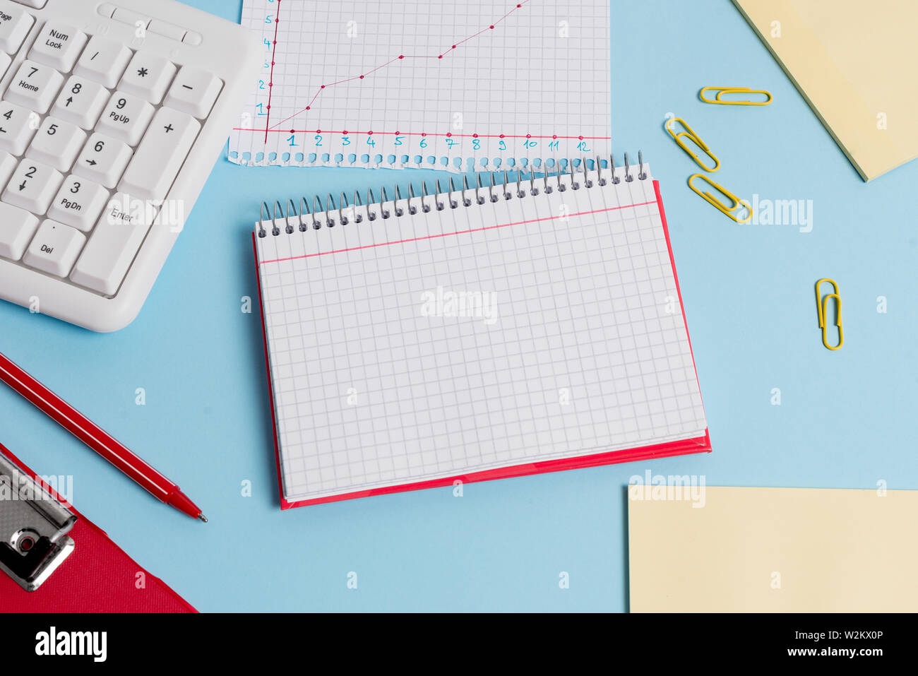 Paper blue desk computer keyboard office study notebook chart numbers ...