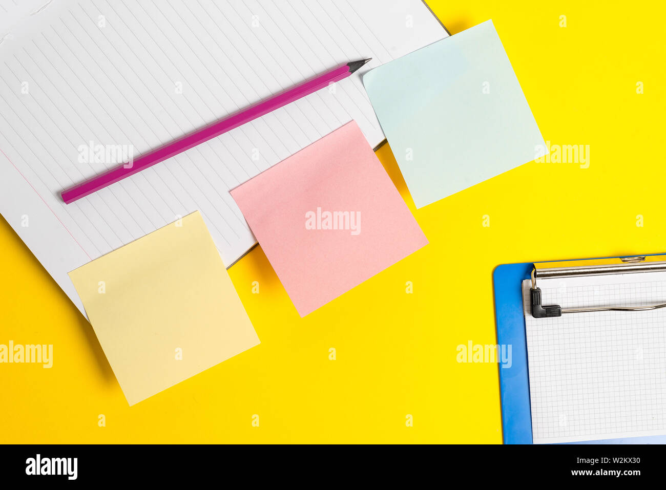 Flat lay above table with blank papers with copy space for text ...
