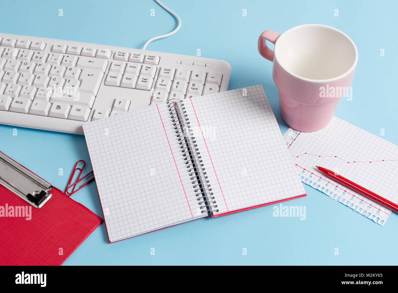 Paper blue desk computer keyboard office study notebook chart numbers ...