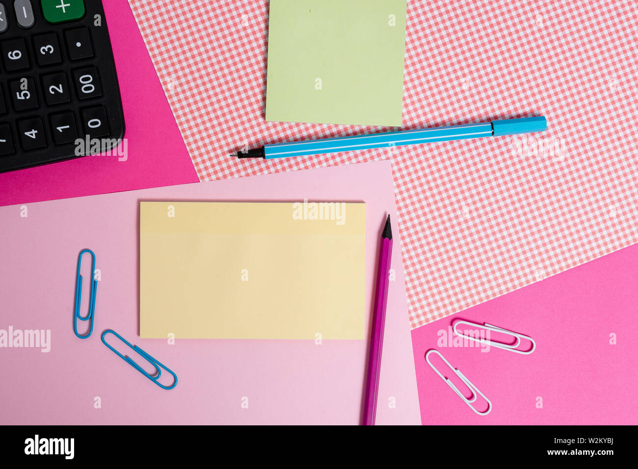 writing equipments with stationary and plain note paper placed on the ...