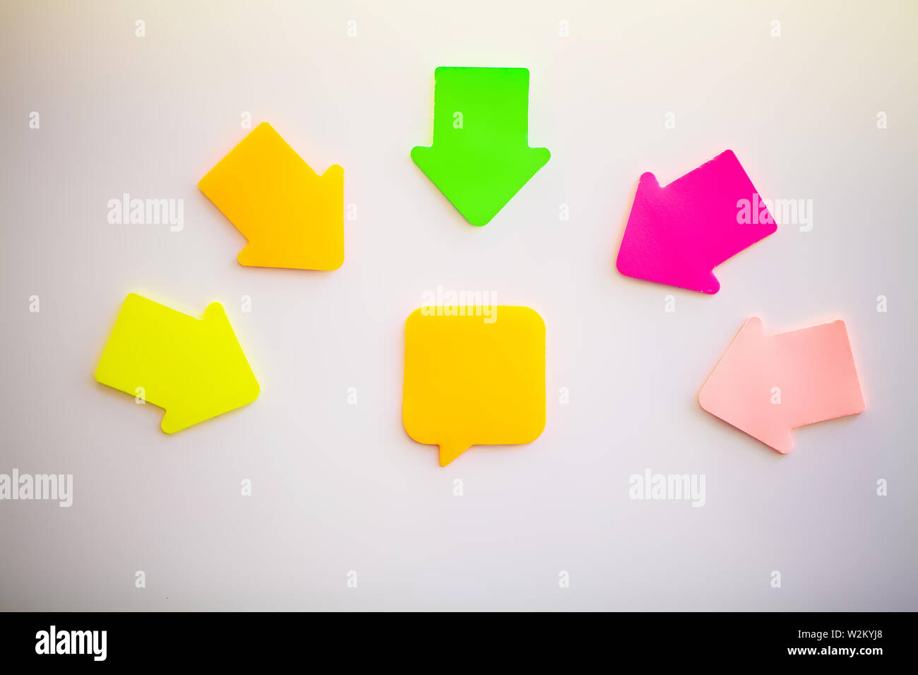 Colorful stickers on white wall. Empty Space for text Stock Photo - Alamy