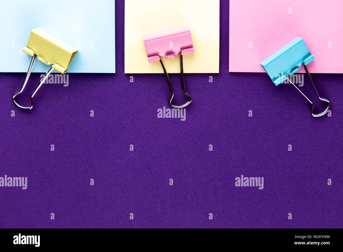 Purple paperclip hi-res stock photography and images - Alamy