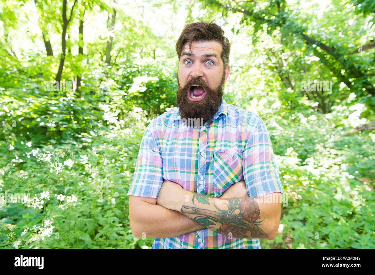 Summer vacation concept. United with environment. Man bearded hipster ...