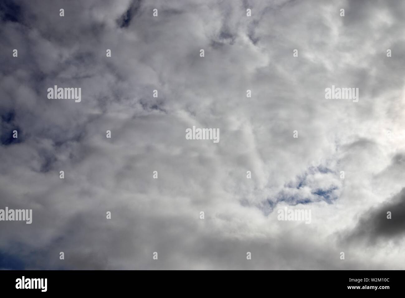 Stunning mixed cloud formations on a blue sky taken in Europe Stock ...
