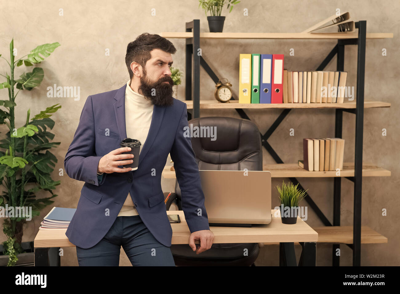 Relaxed top manager drinking coffee. Man bearded manager businessman ...