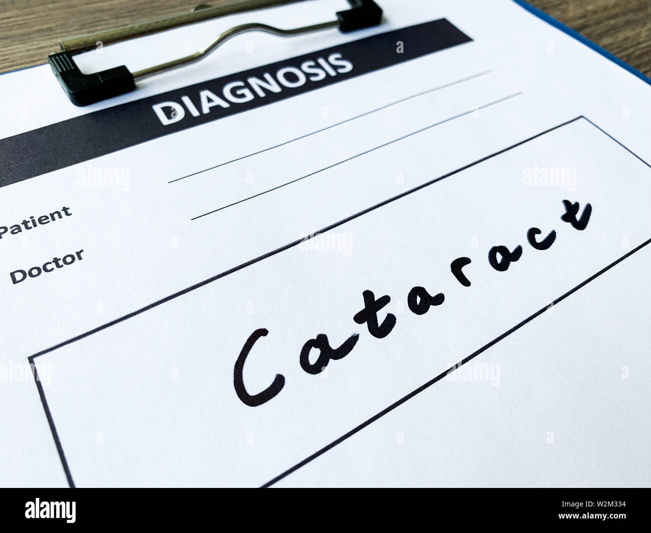 Diagnosis cataract in a medical form on the doctor desk Stock Photo - Alamy