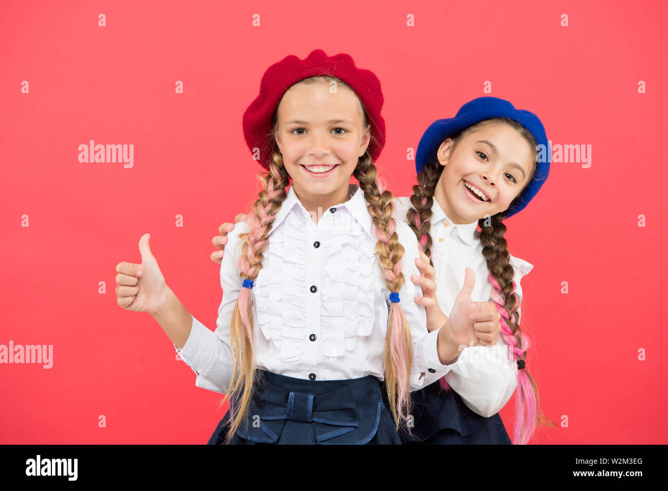 Girls best friends on red background. True friends always stand beside ...