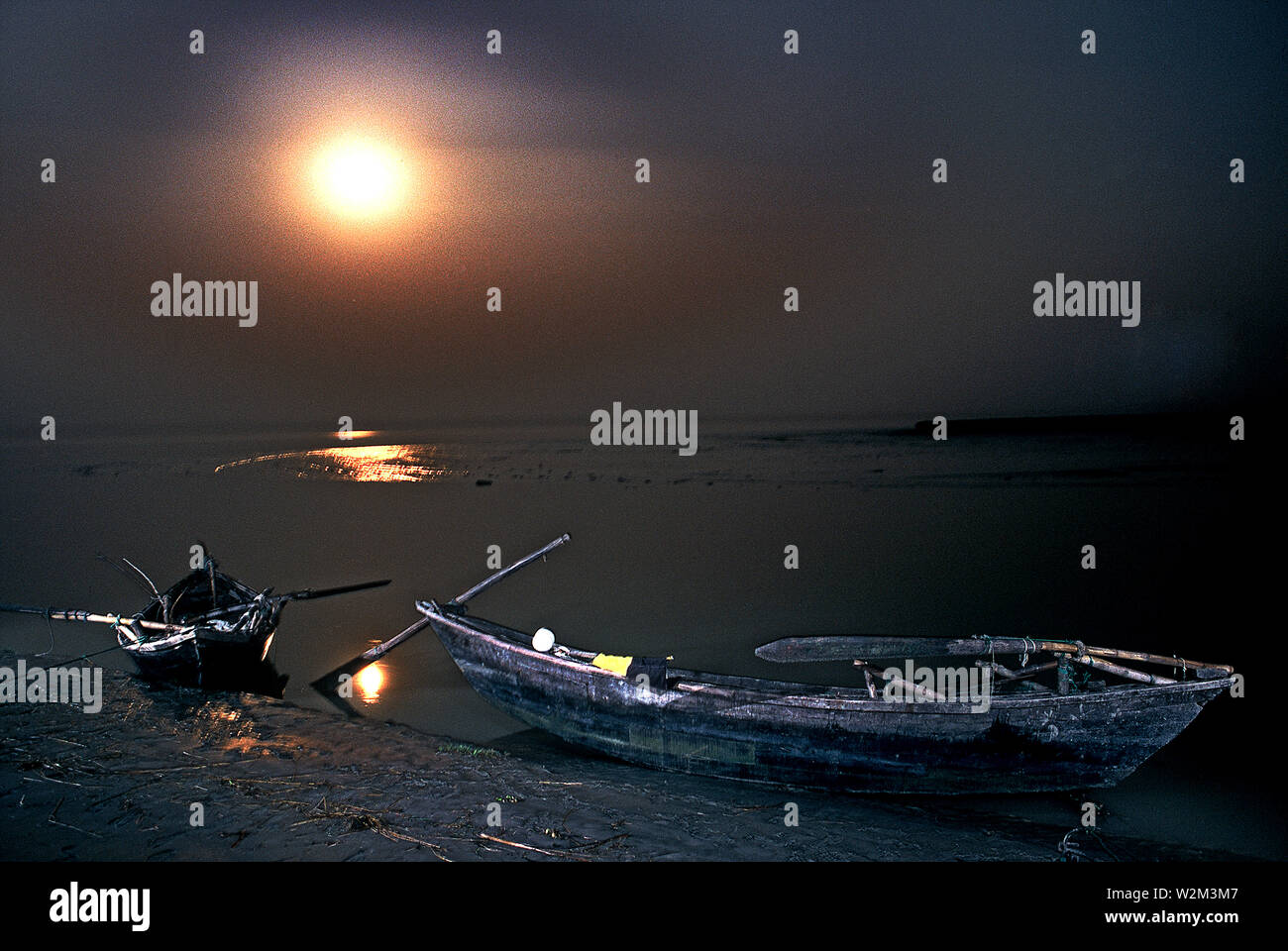 A sunset. Brahmaputra the major river of Central and South Asia, flows ...