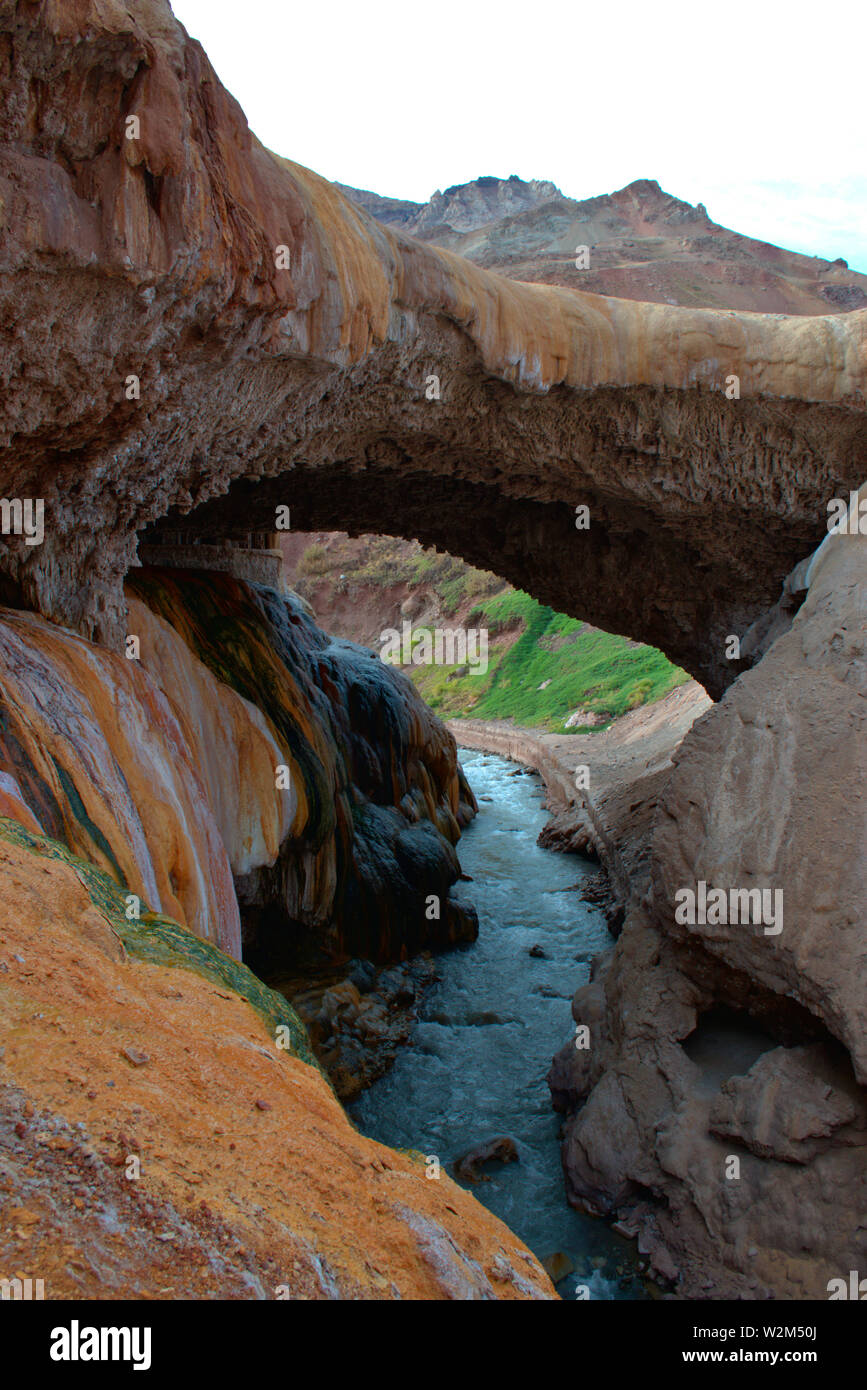 View from below the natural stone bridge of Puente del Inca in Mendoza ...