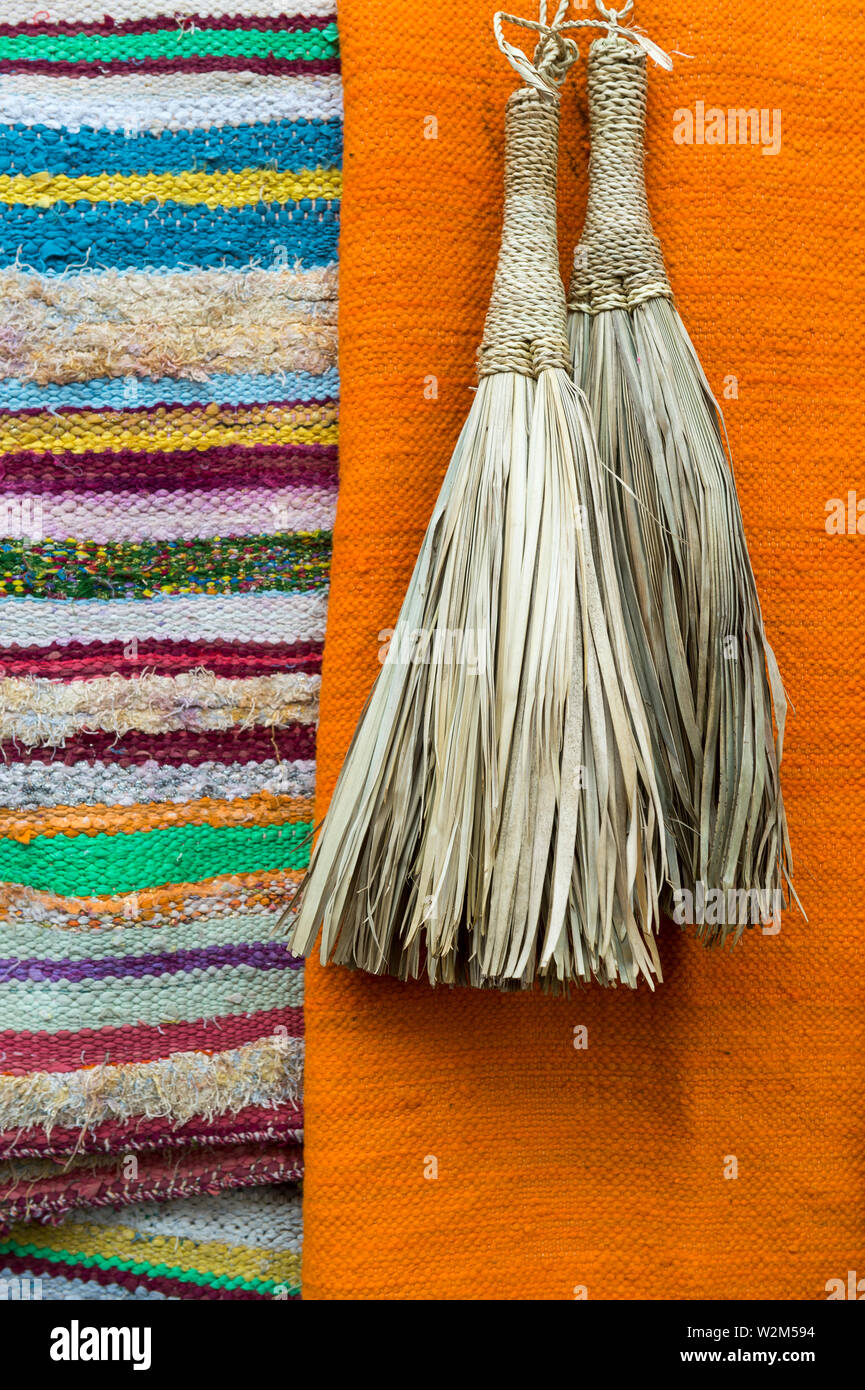 Textured background of brightly colored fabrics in bold stripes with ...