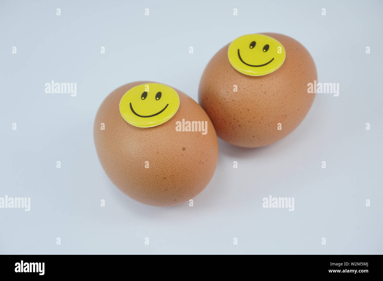 Fresh food, brown egg, garlic, red tomato, almonds Healthy Smiley Happy ...